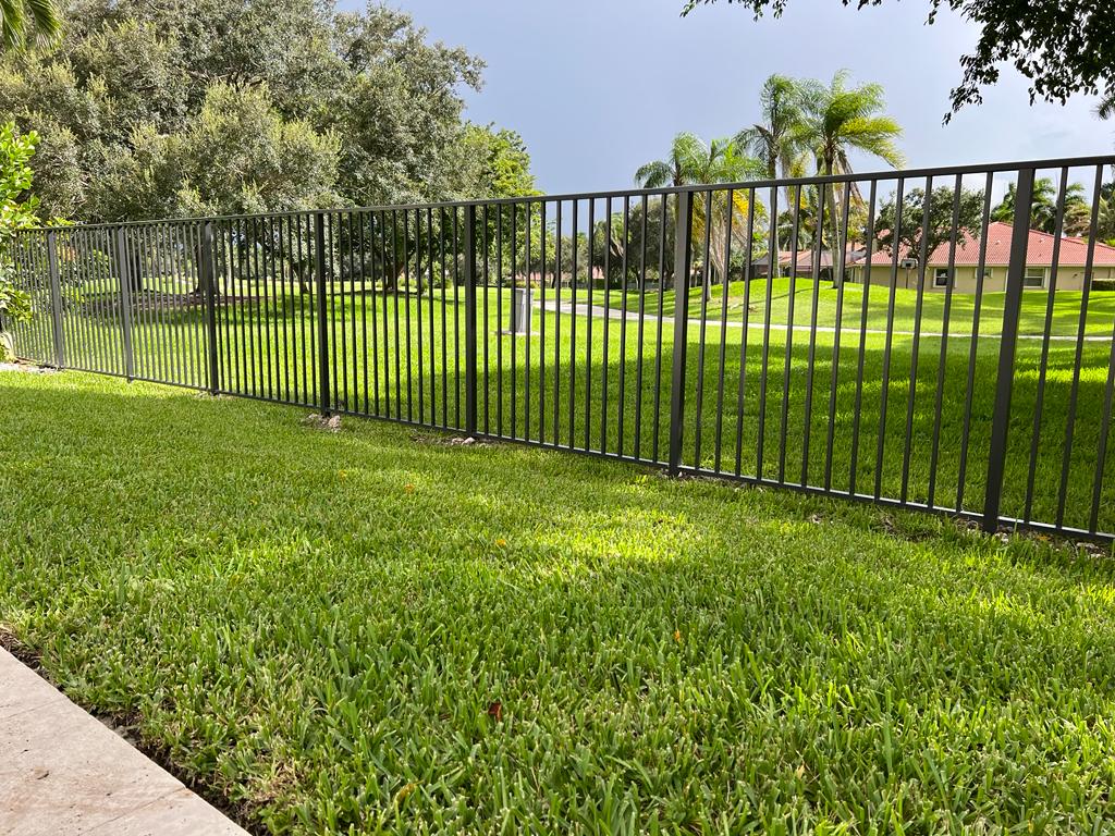 Mechanical Aluminum Fence Installation - South Florida Fence ...